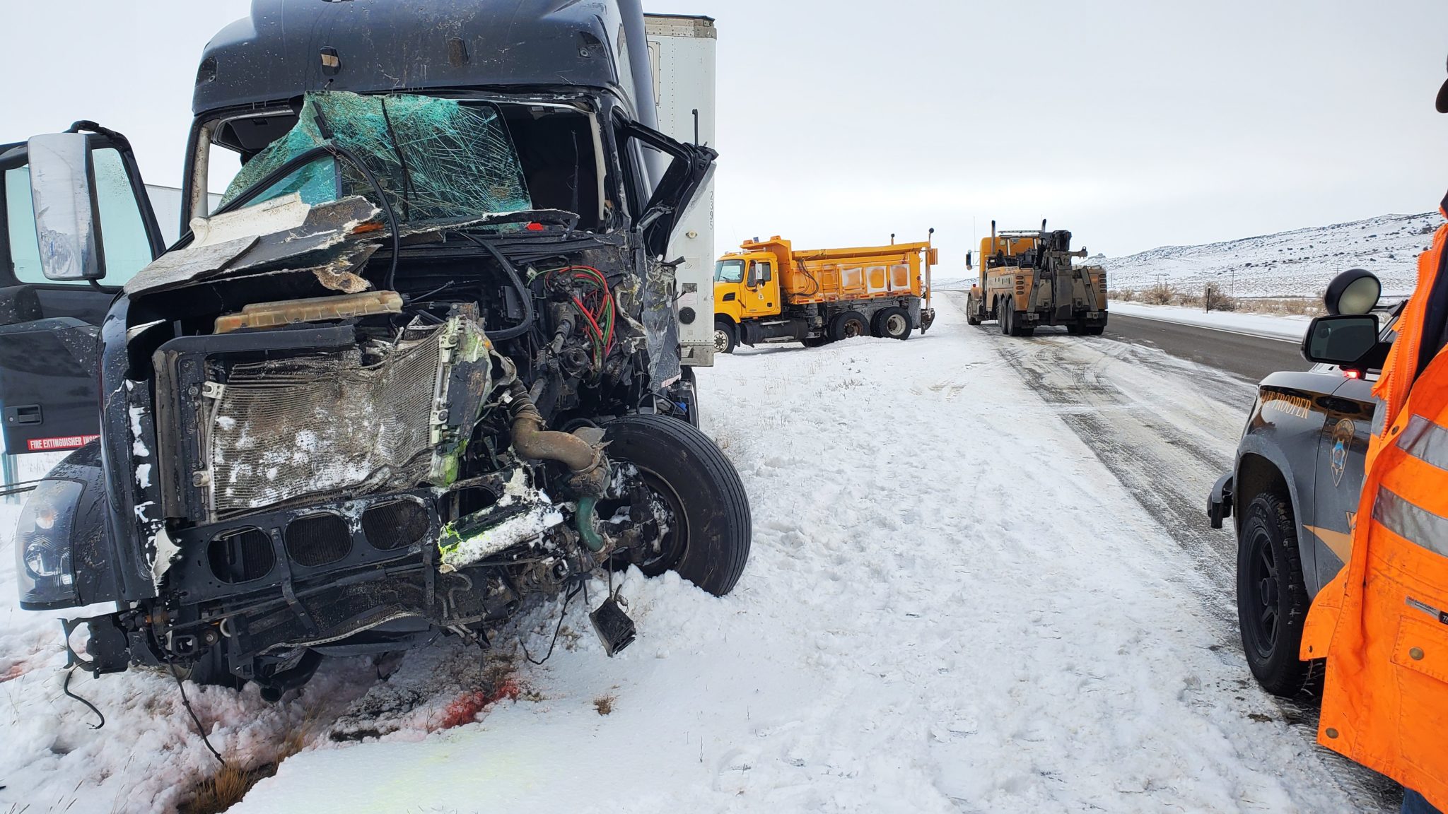 A commercial vehicle collides with a Wyoming Department of ...